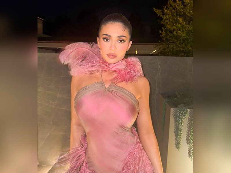 Kylie Jenner sets mercury soaring as she sizzles in gold metallic bikini